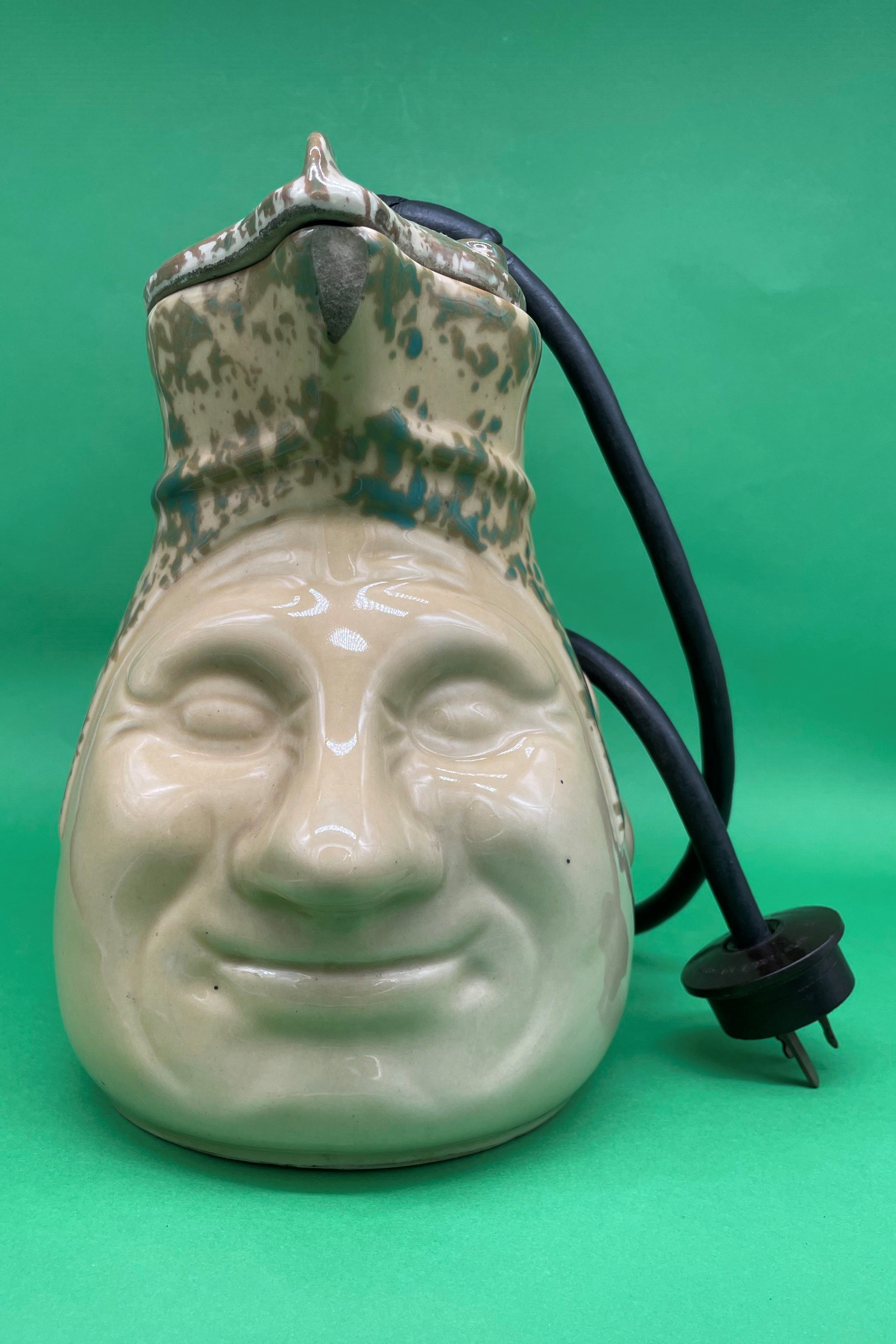 Sunshine Electrix Man character jug - Bendigo Pottery circa 1950